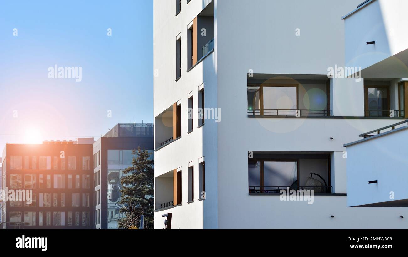 Futuristic square architecture of apartment building. Real estate with ...