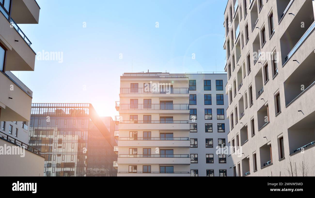 Futuristic square architecture of apartment building. Real estate with ...