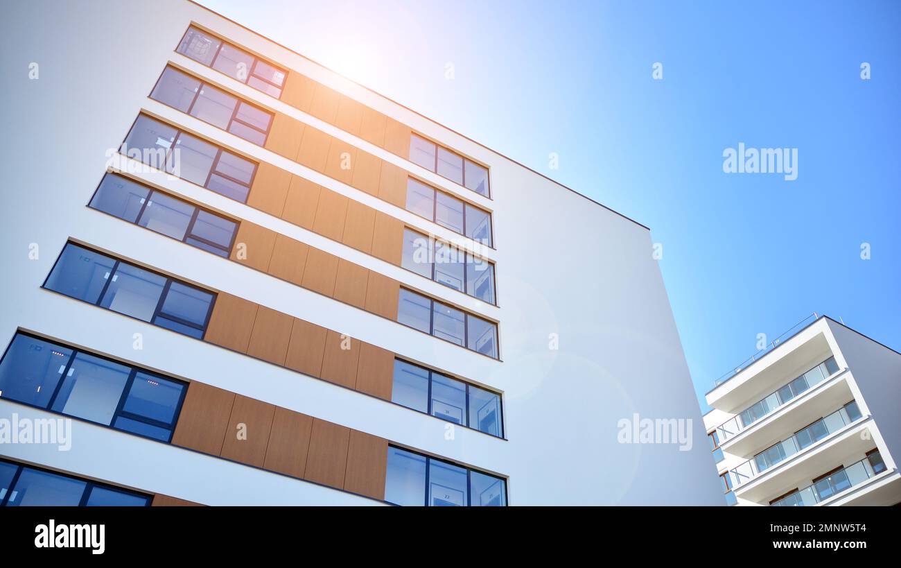 Futuristic square architecture of apartment building. Real estate with ...