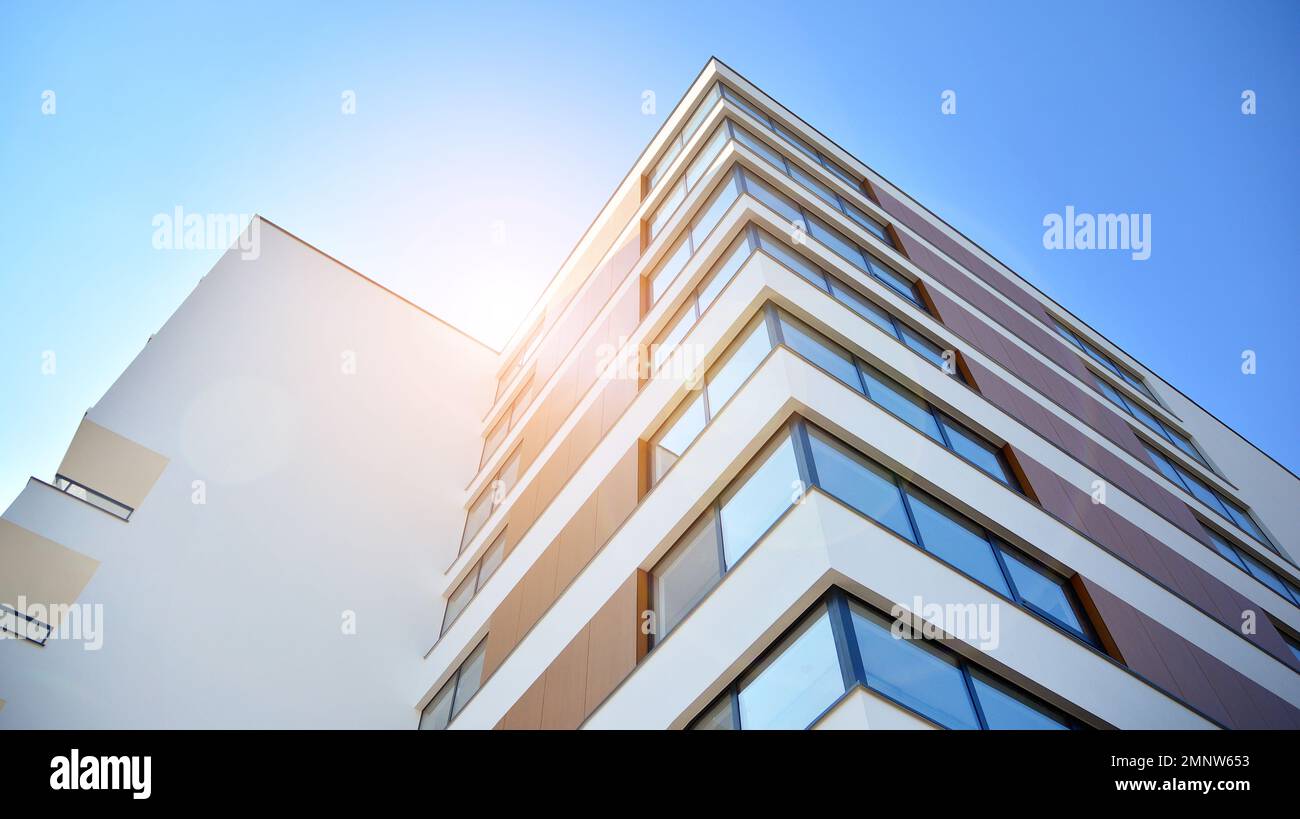 Futuristic square architecture of apartment building. Real estate with ...