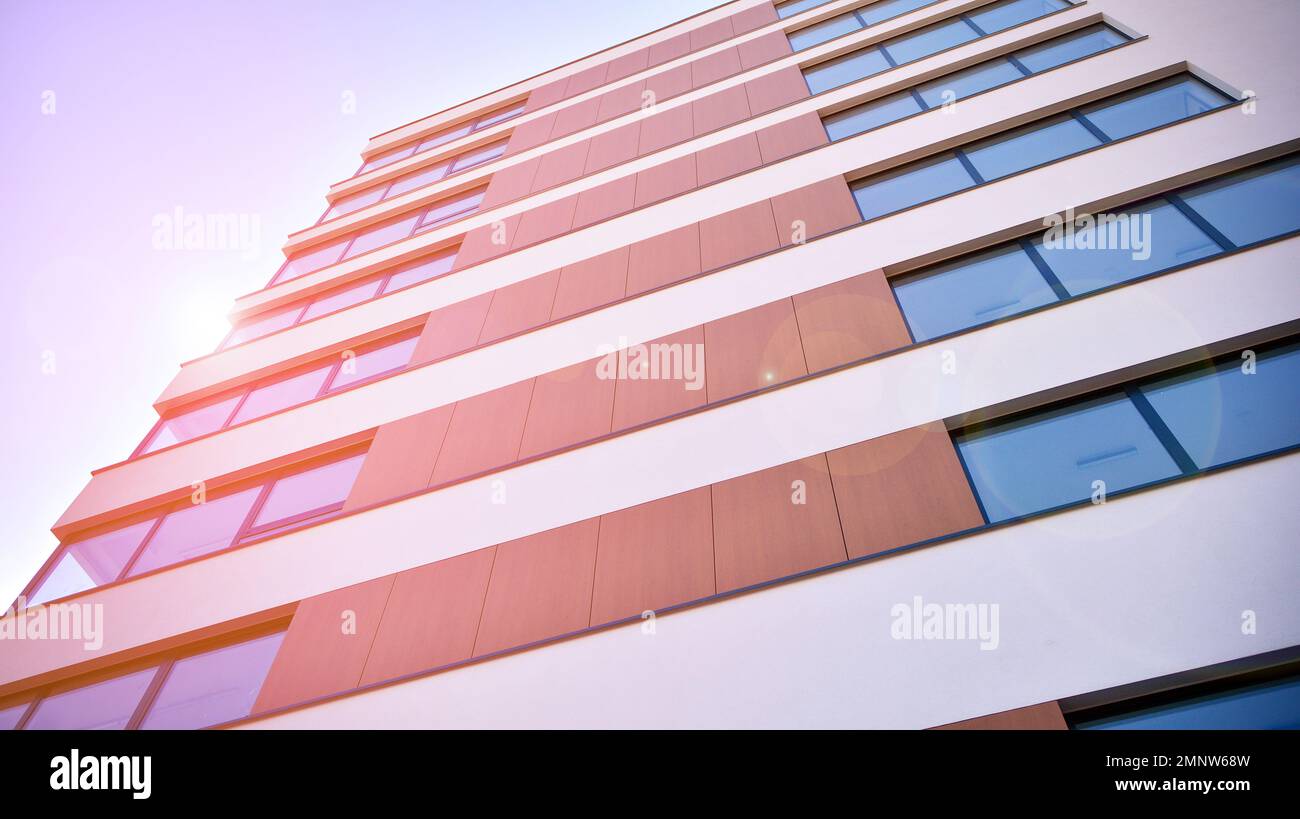 Futuristic square architecture of apartment building. Real estate with ...