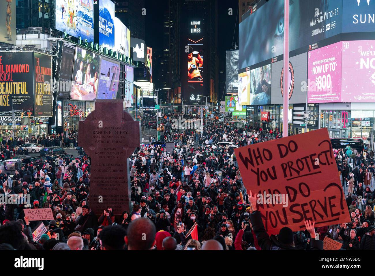 FILE - Demonstrators gather during a protest in Times Square on ...