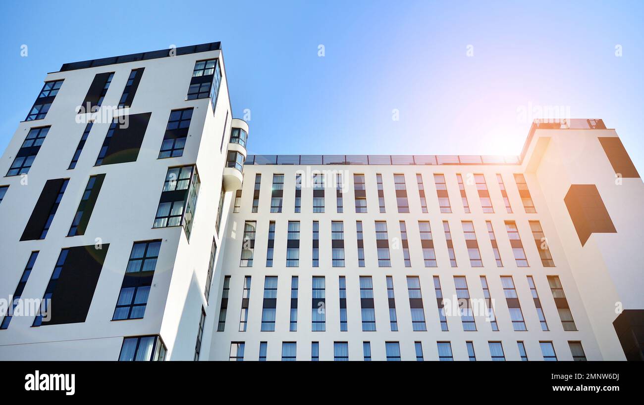 Futuristic square architecture of apartment building. Real estate with ...