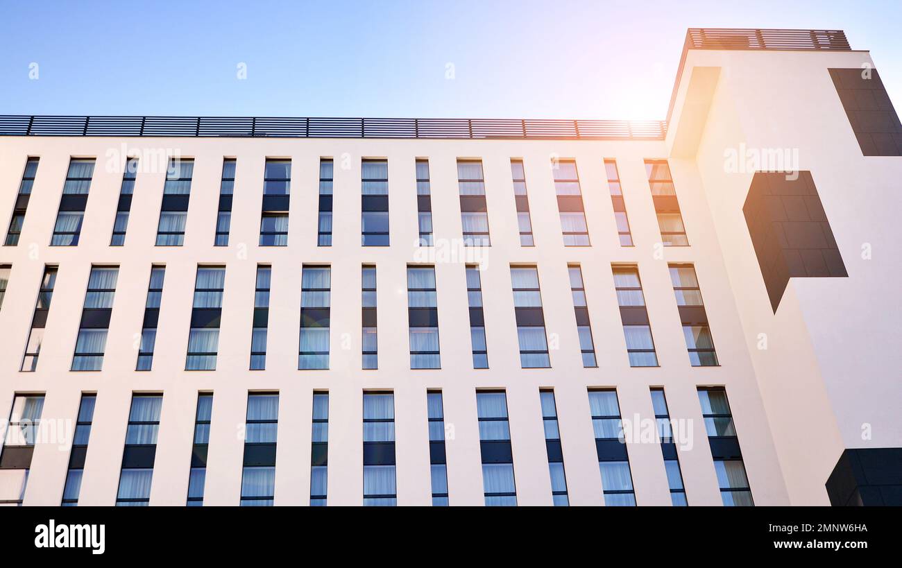 Futuristic square architecture of apartment building. Real estate with ...