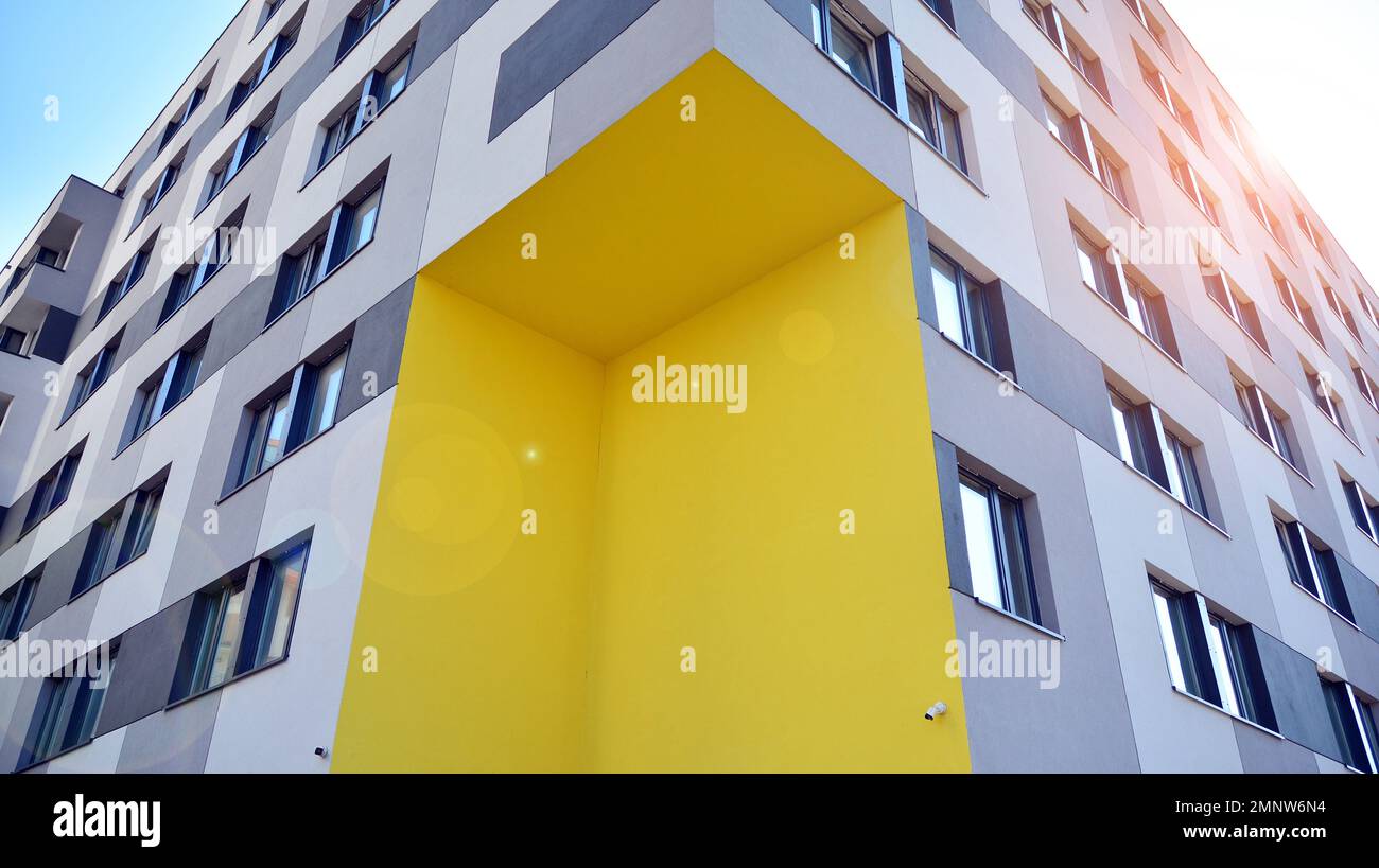 Futuristic square architecture of apartment building. Real estate with ...
