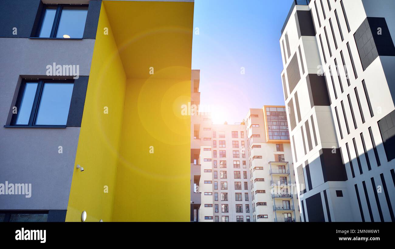 Futuristic square architecture of apartment building. Real estate with ...