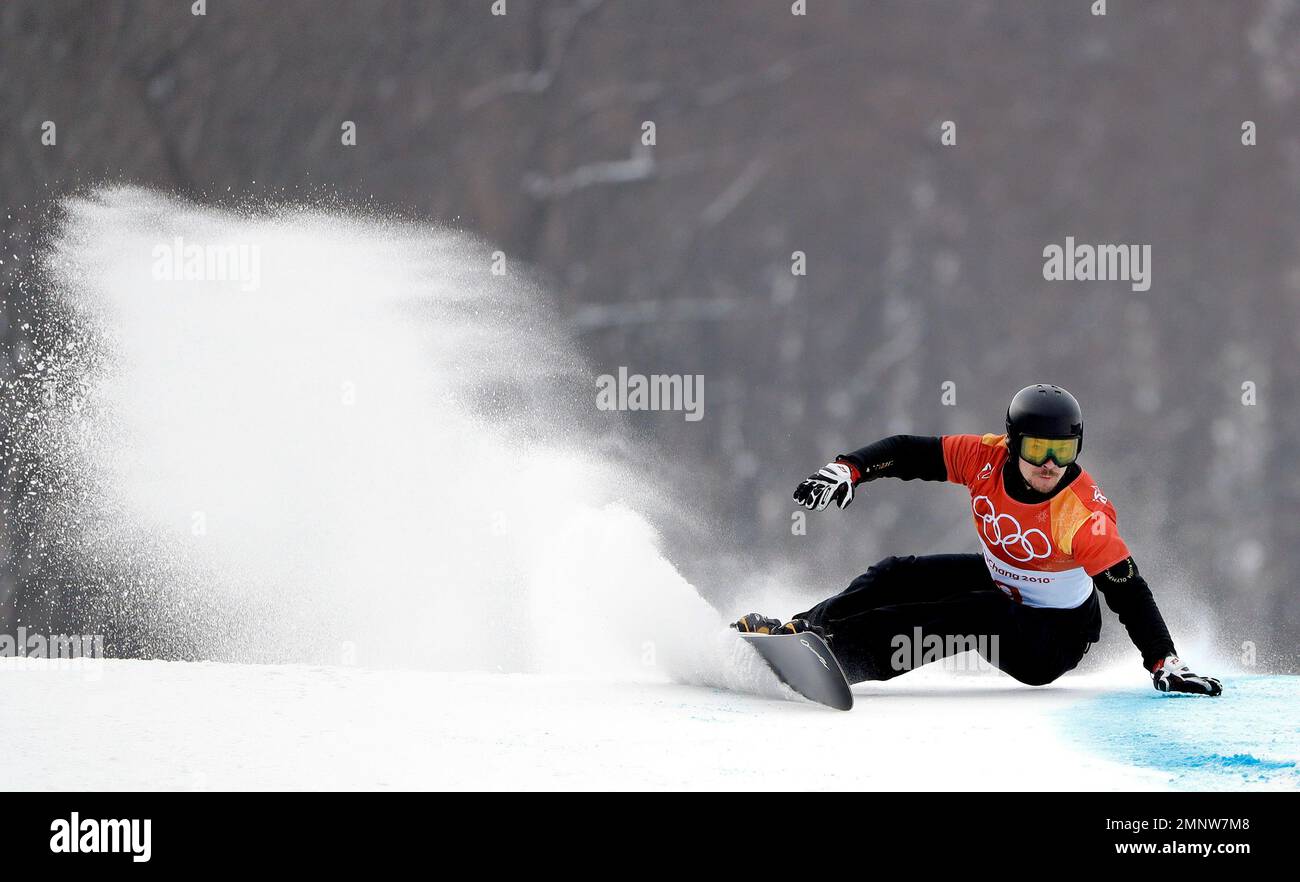 Russian athlete VicWild runs the course during the men's parallel giant ...