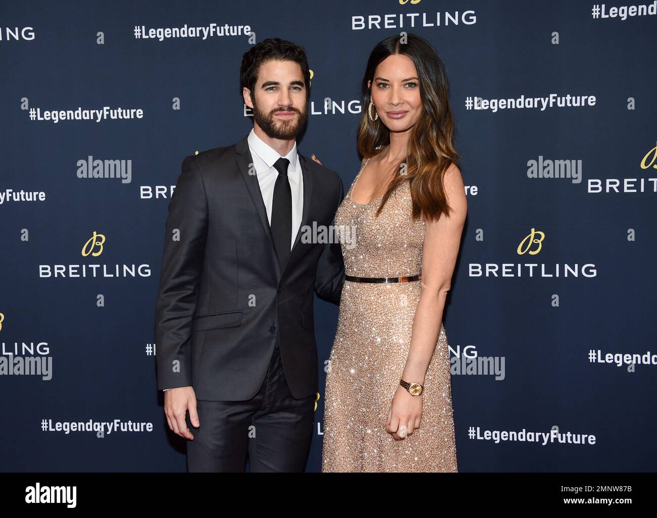 Actors Darren Criss, left, and Olivia Munn attend the Breitling Global ...