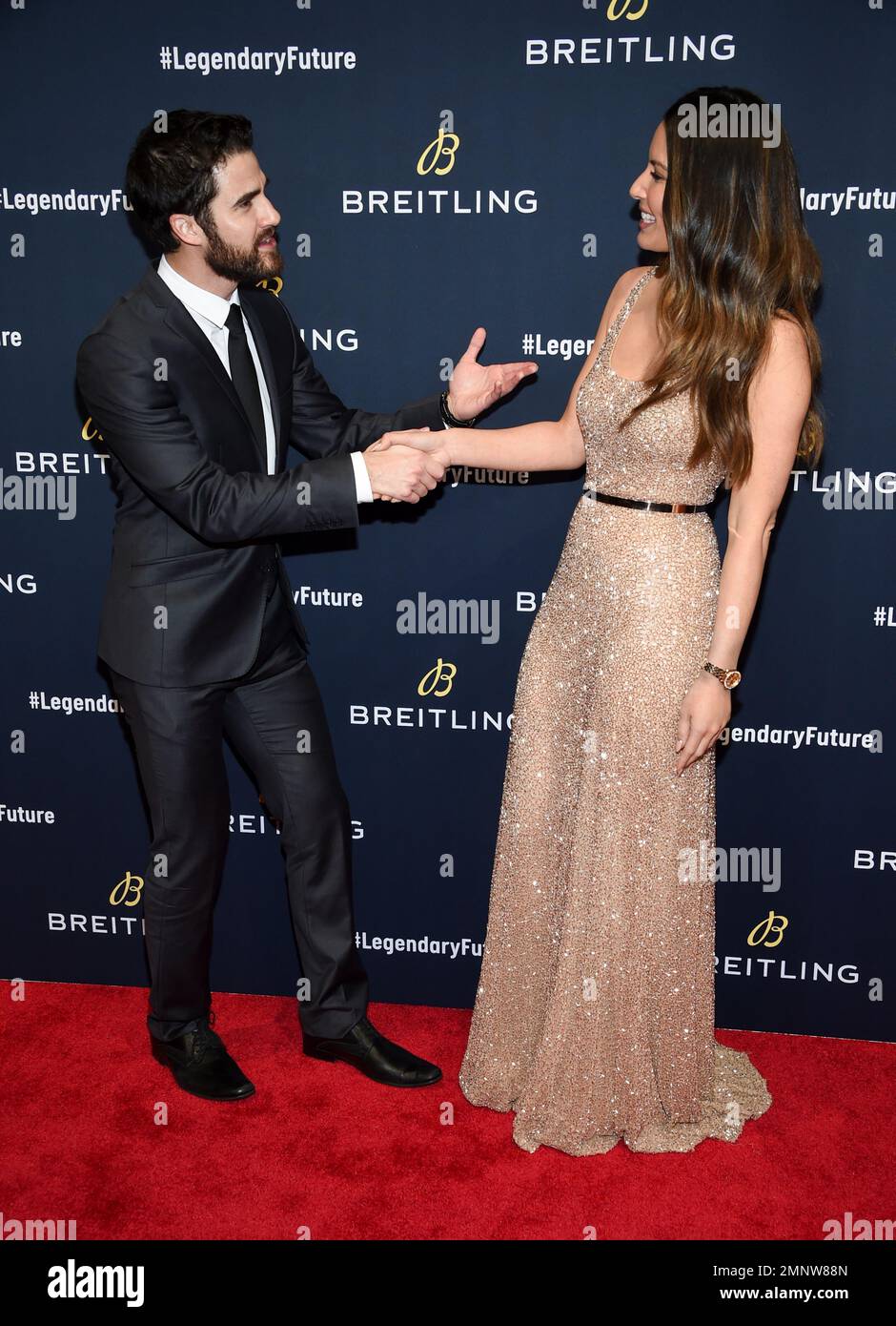 Actors Darren Criss, left, and Olivia Munn attend the Breitling Global ...