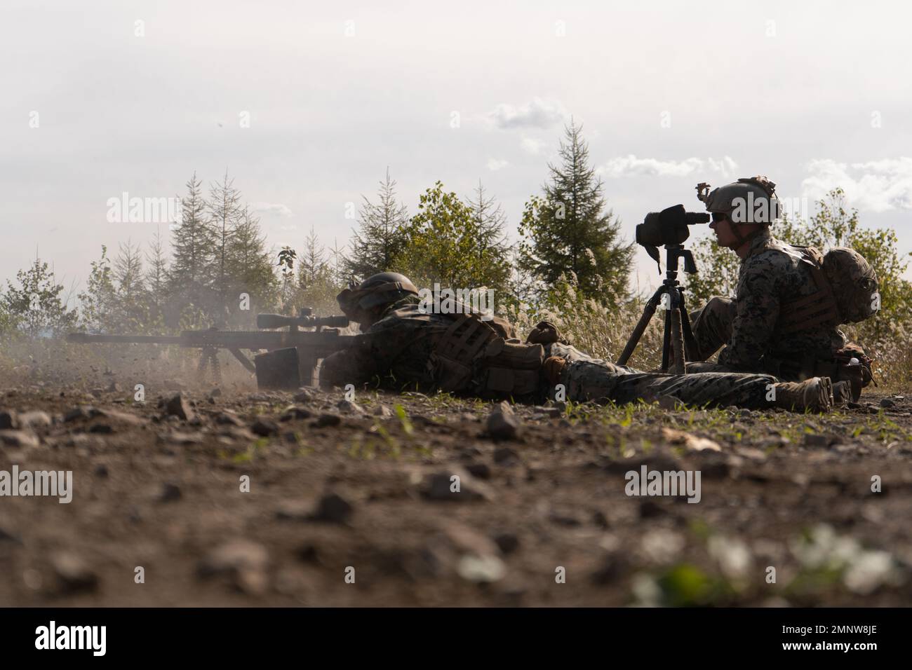 U.S. Marine Corps Sgt. Ryan Lauritsen (left) and Cpl. Jack Secrest ...