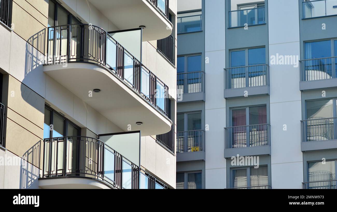 Futuristic square architecture of apartment building. Real estate with ...
