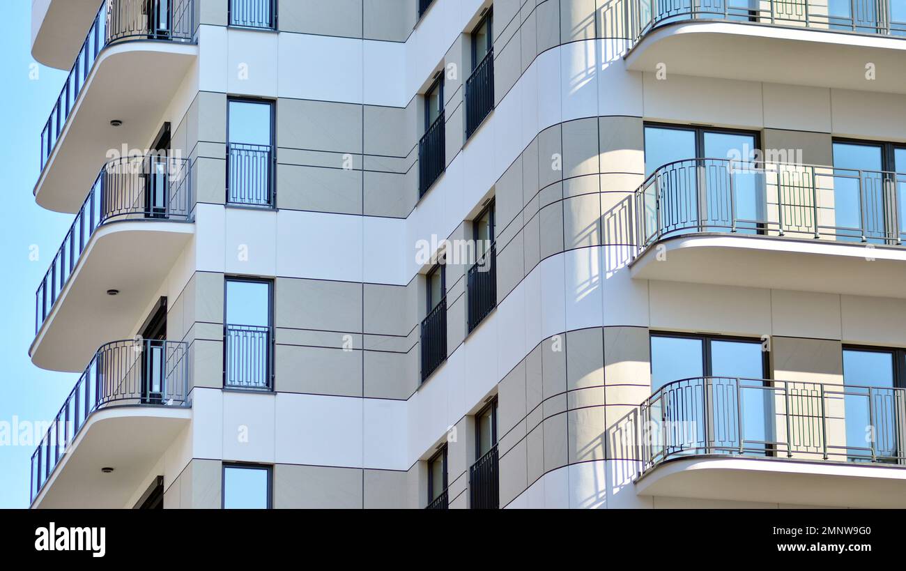 Futuristic square architecture of apartment building. Real estate with ...