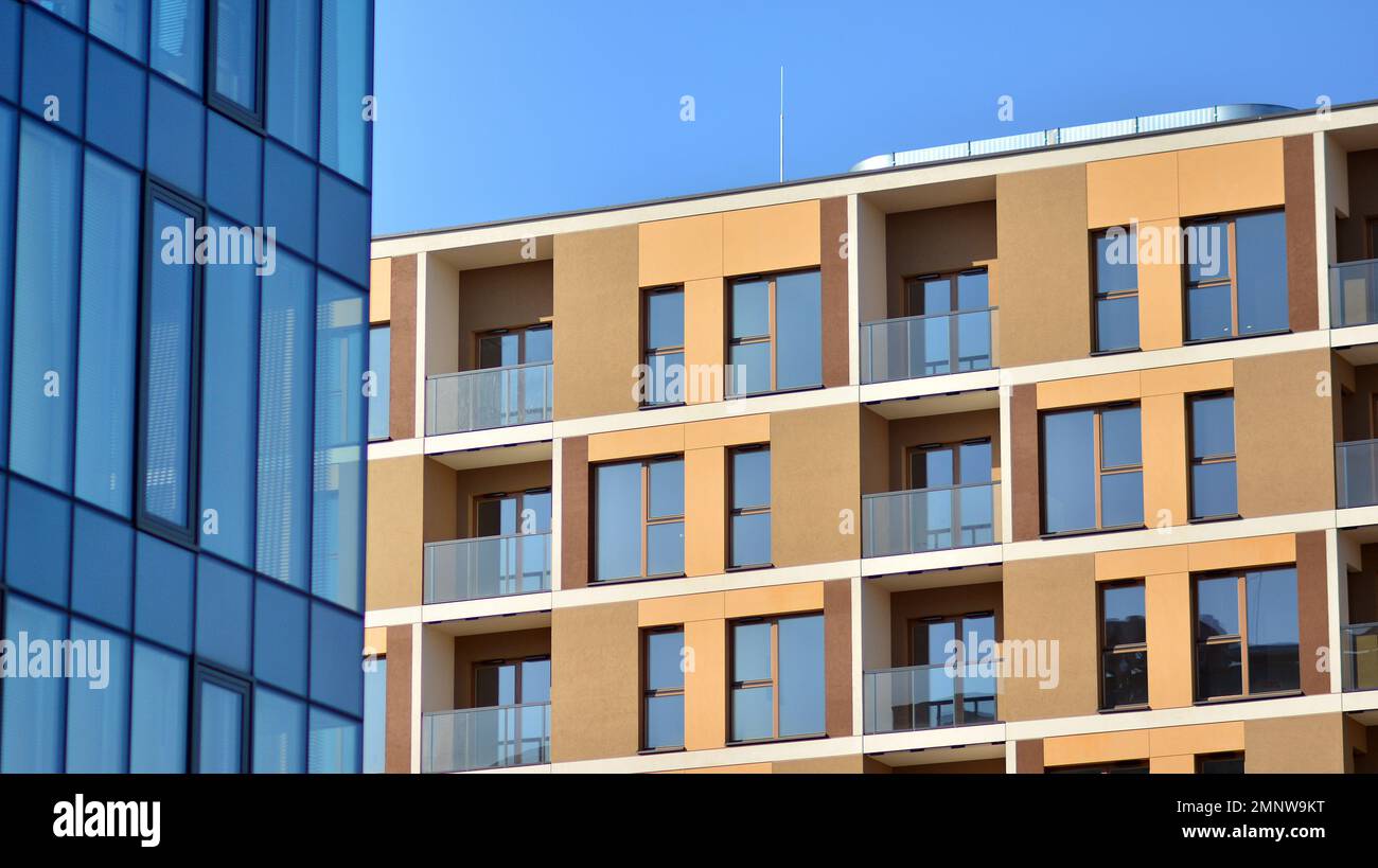 Futuristic square architecture of apartment building. Real estate with ...
