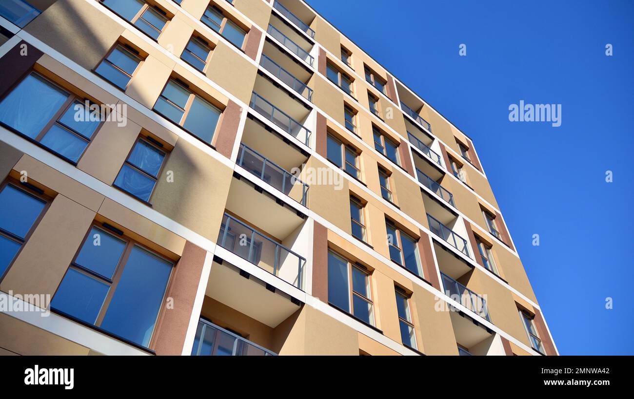 Futuristic square architecture of apartment building. Real estate with ...