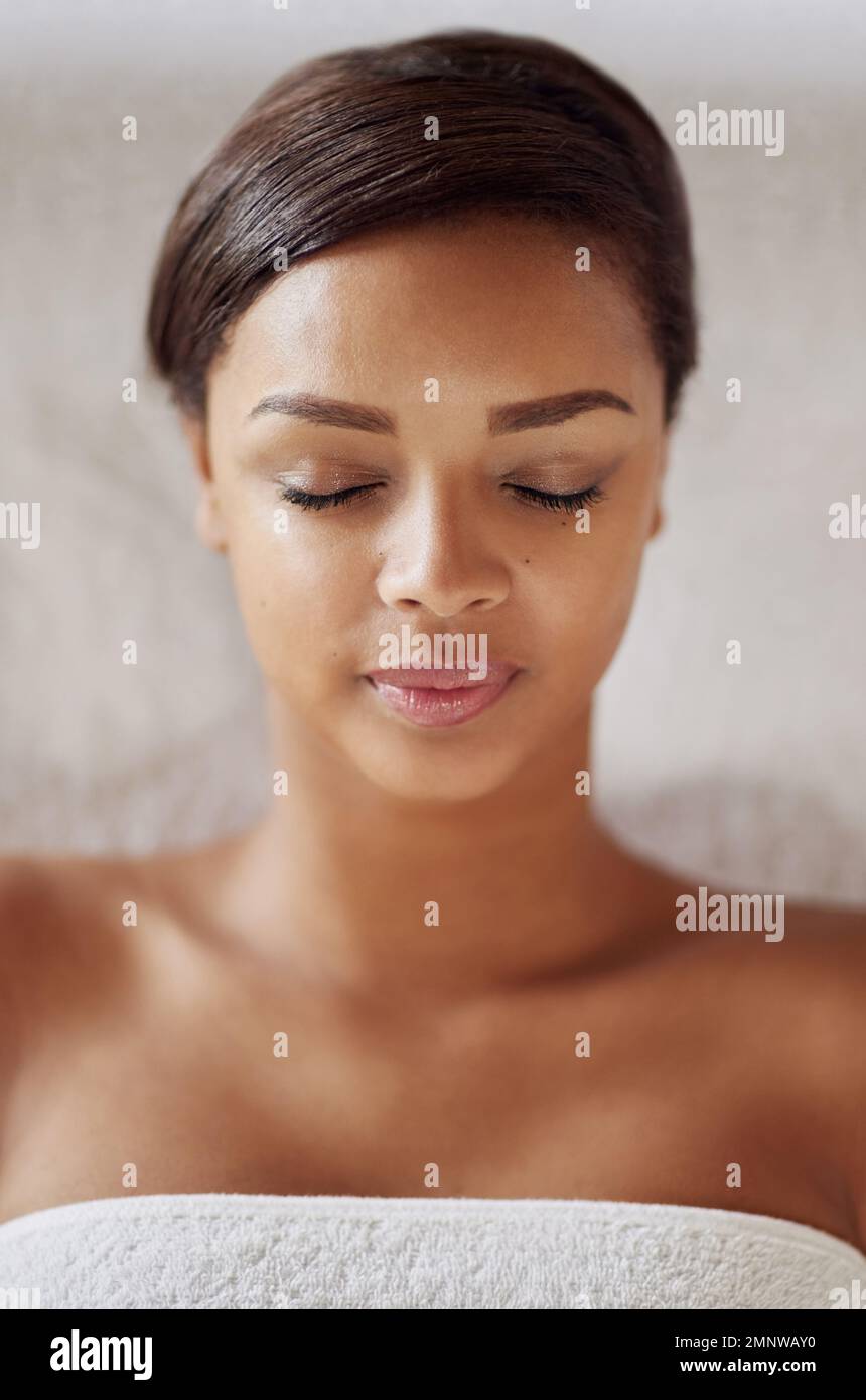 Today is for being pampered. a beautiful young woman at the beauty spa ...