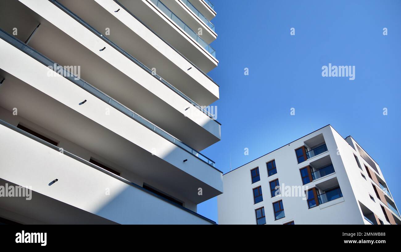 Futuristic square architecture of apartment building. Real estate with ...