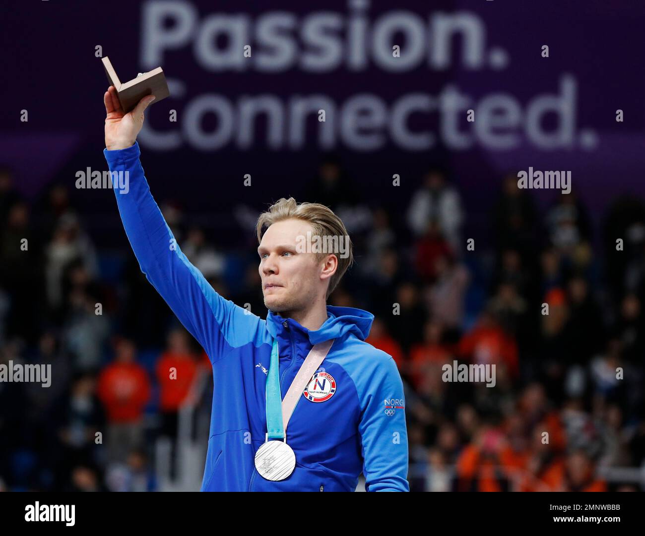 Silver medalist Havard Lorentzen of Norway celebrates on the podium ...