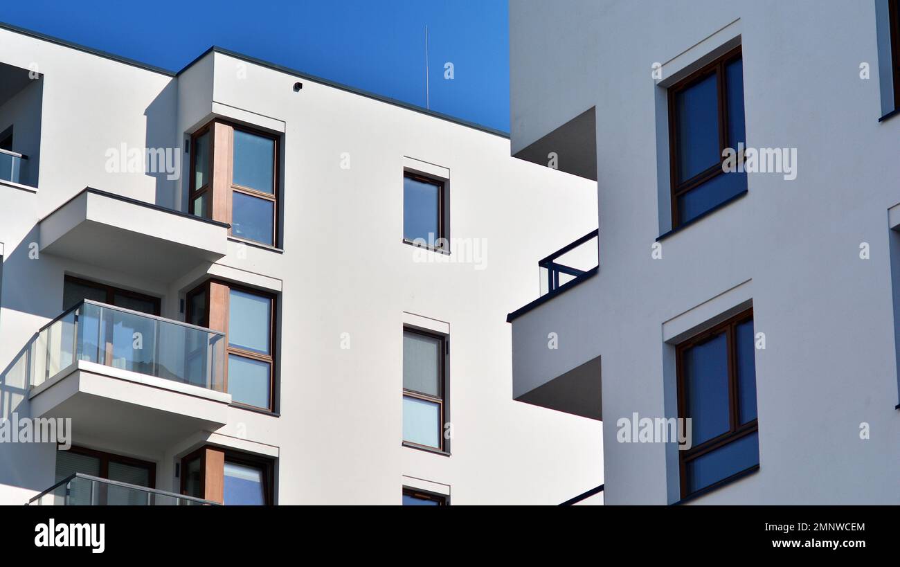 Futuristic square architecture of apartment building. Real estate with ...