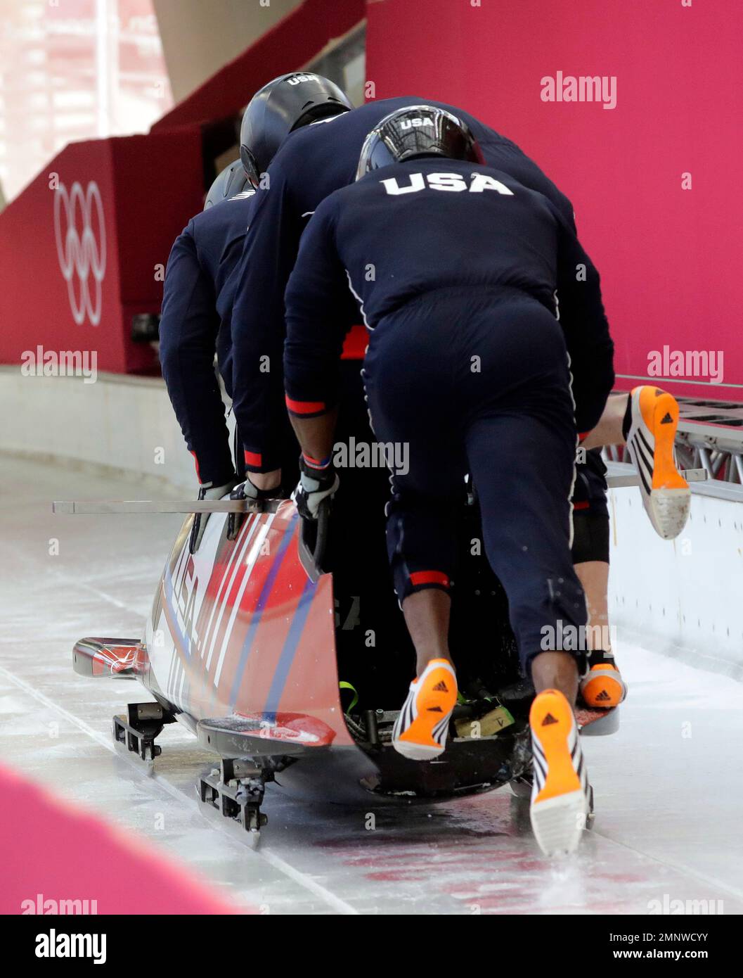 Driver Justin Olsen, Christopher Fogt, Carlo Valdes and Nathan Weber of ...