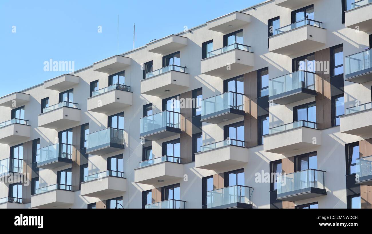 Futuristic square architecture of apartment building. Real estate with ...