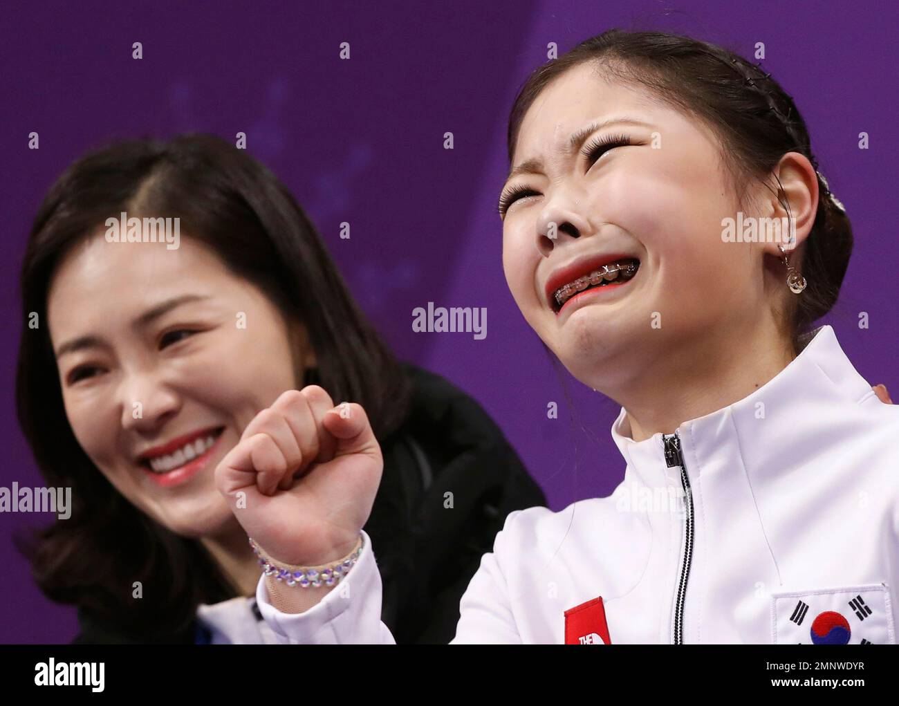 Kim Hanul of South Korea reacts as her scores are posted following her ...