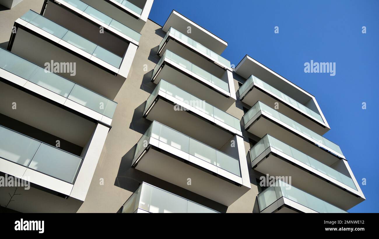 Futuristic square architecture of apartment building. Real estate with ...