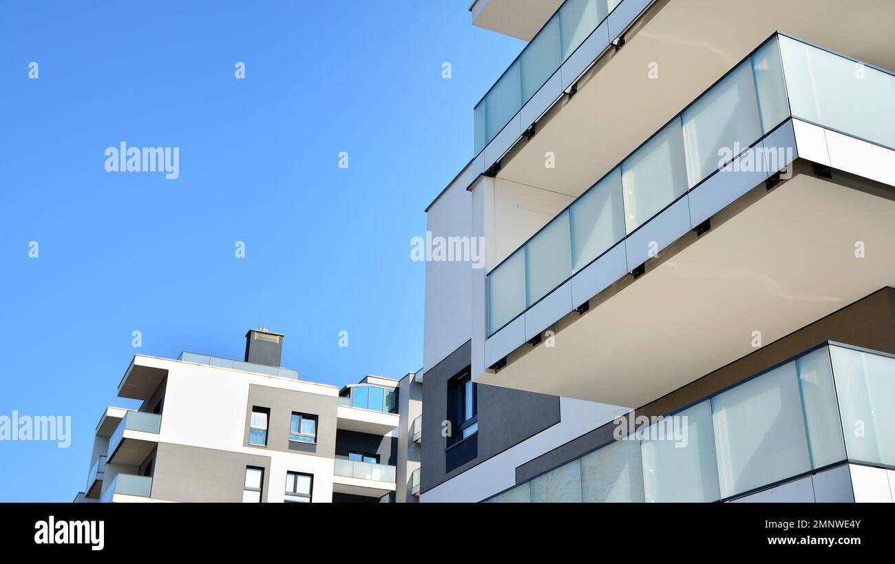 Futuristic square architecture of apartment building. Real estate with ...