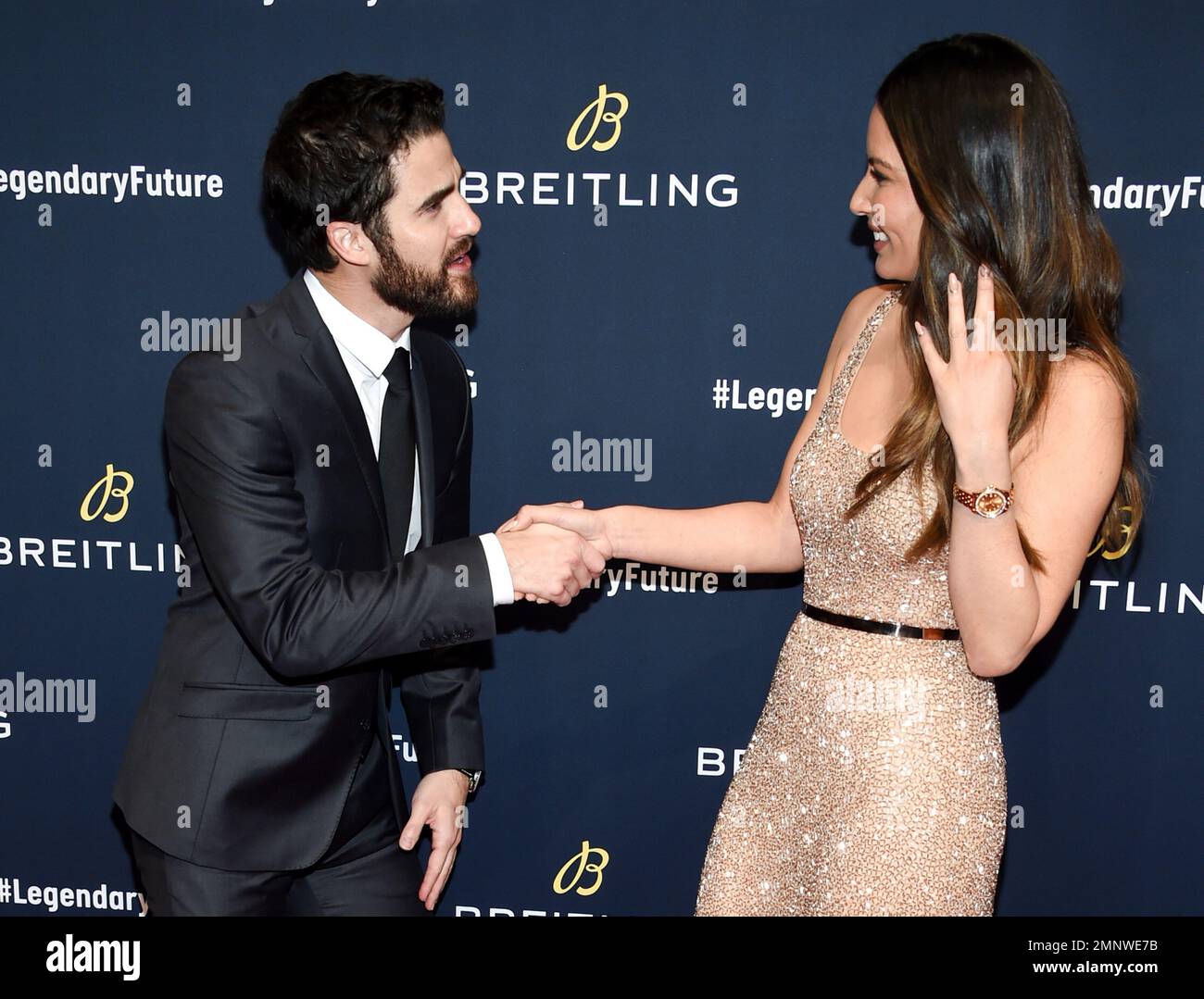 Actors Darren Criss, left, and Olivia Munn attend the Breitling Global ...