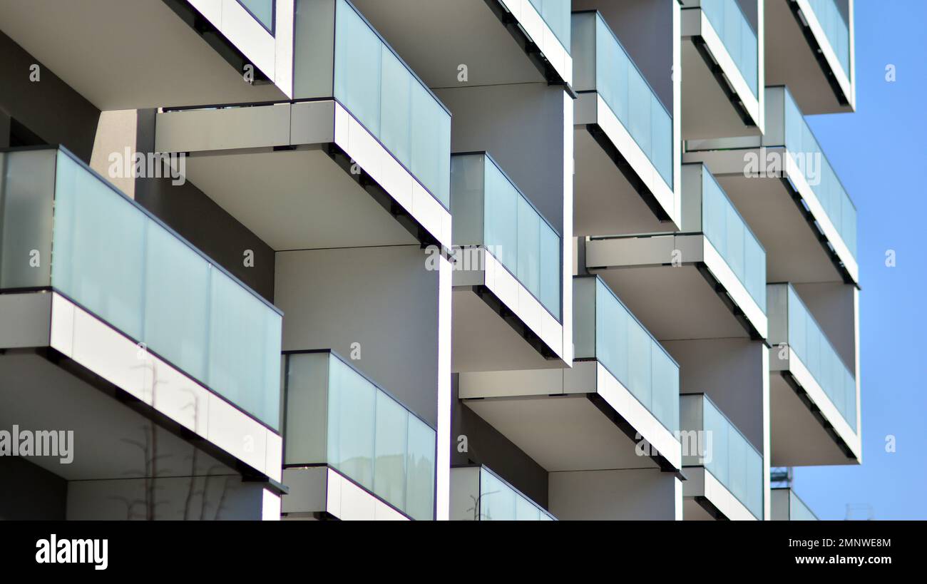 Futuristic square architecture of apartment building. Real estate with ...