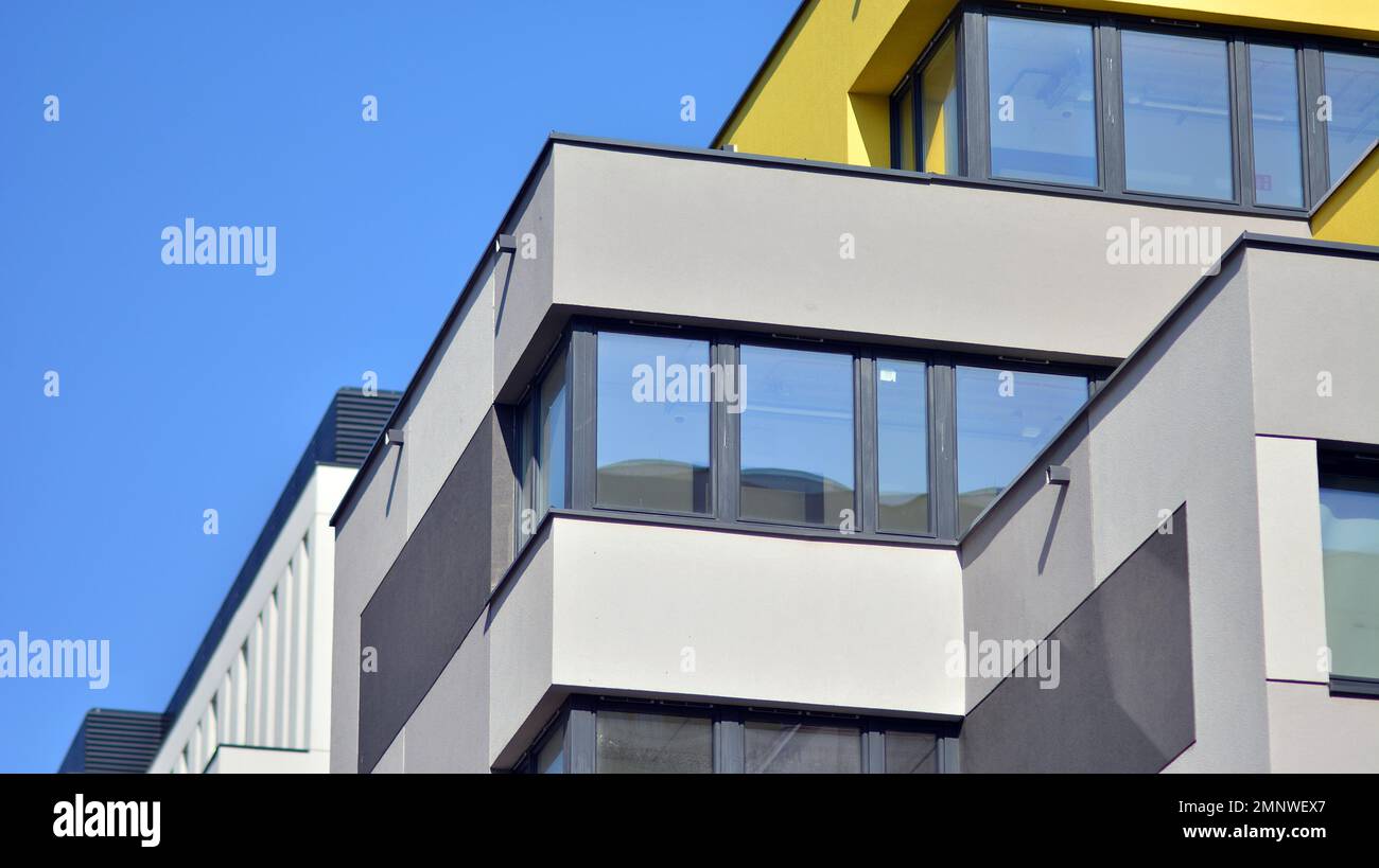 Futuristic square architecture of apartment building. Real estate with ...