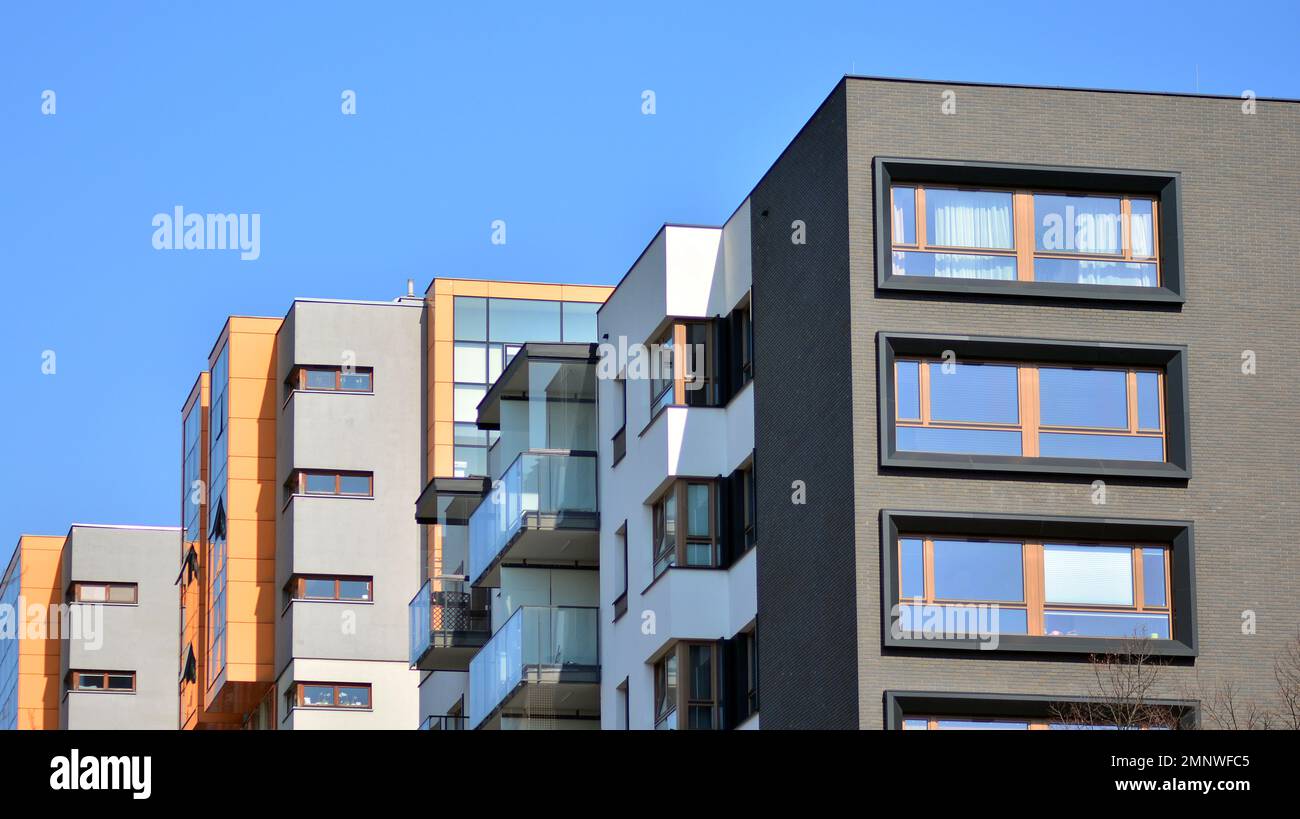 Futuristic square architecture of apartment building. Real estate with ...