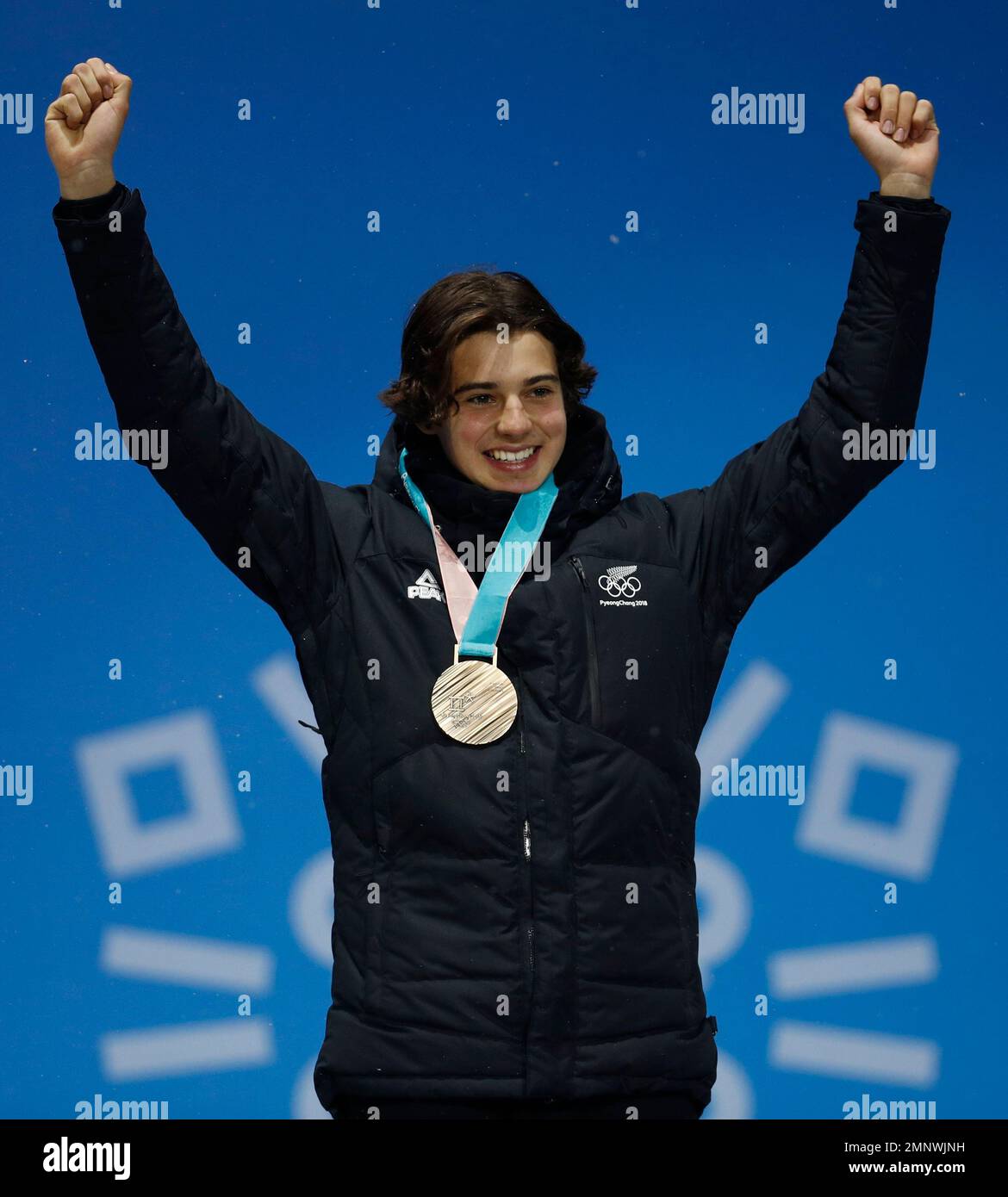 Bronze medalist in the men's halfpipe Nico Porteous, of New Zealand ...