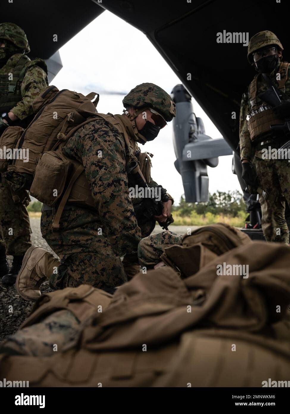 U.S. Navy Petty Officer Third Class John Dalton Nocon, a corpsman with ...