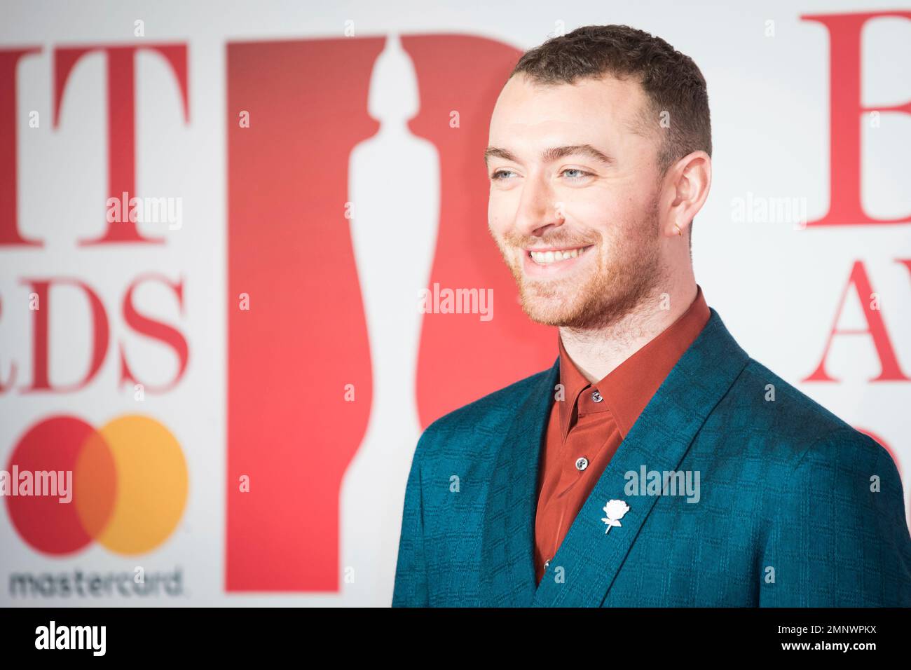 Sam Smith poses for photographers upon arrival at the Brit Awards 2018 ...