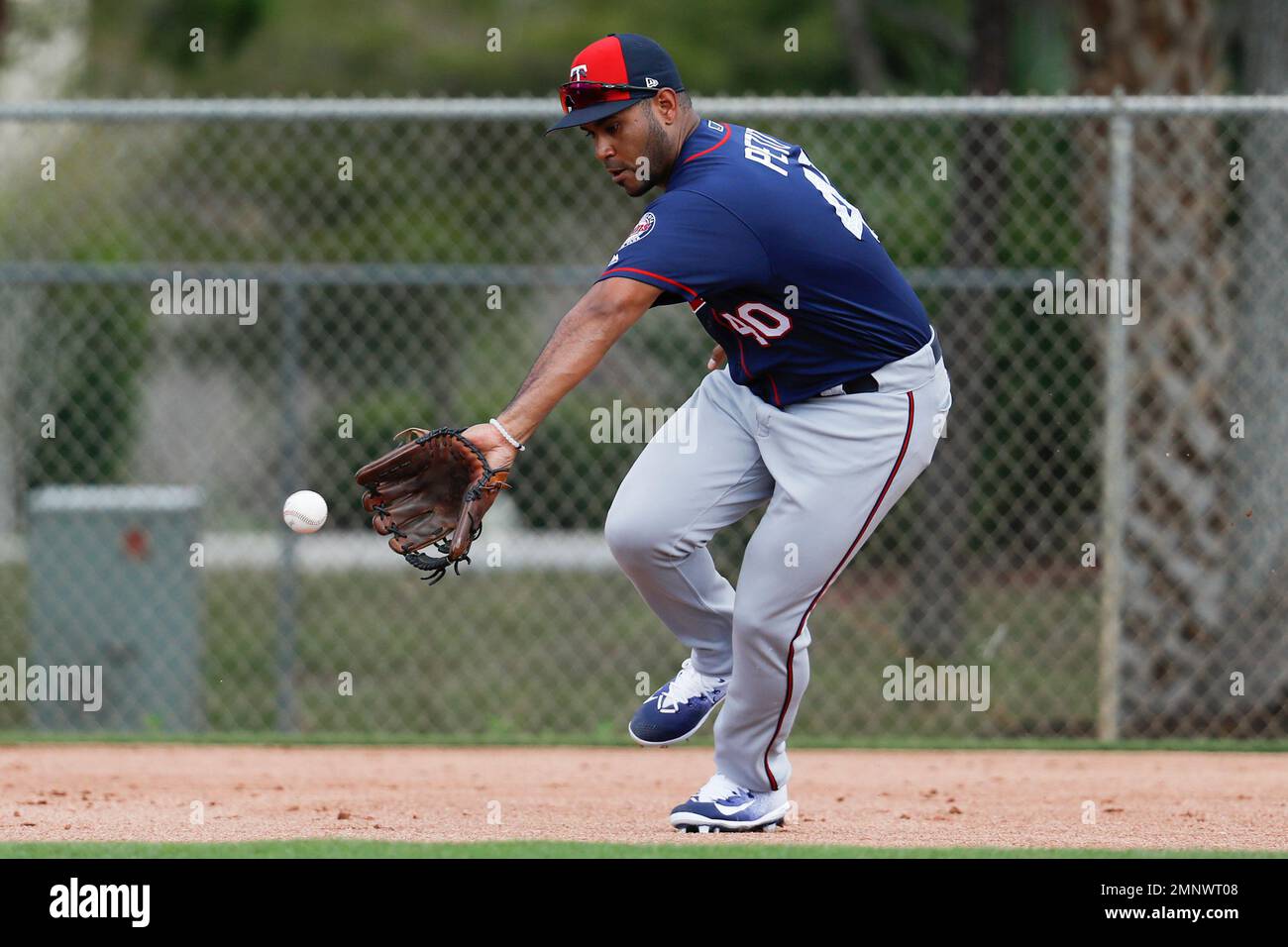 Minnesota Twins second baseman Gregorio Petit practices a drill during ...