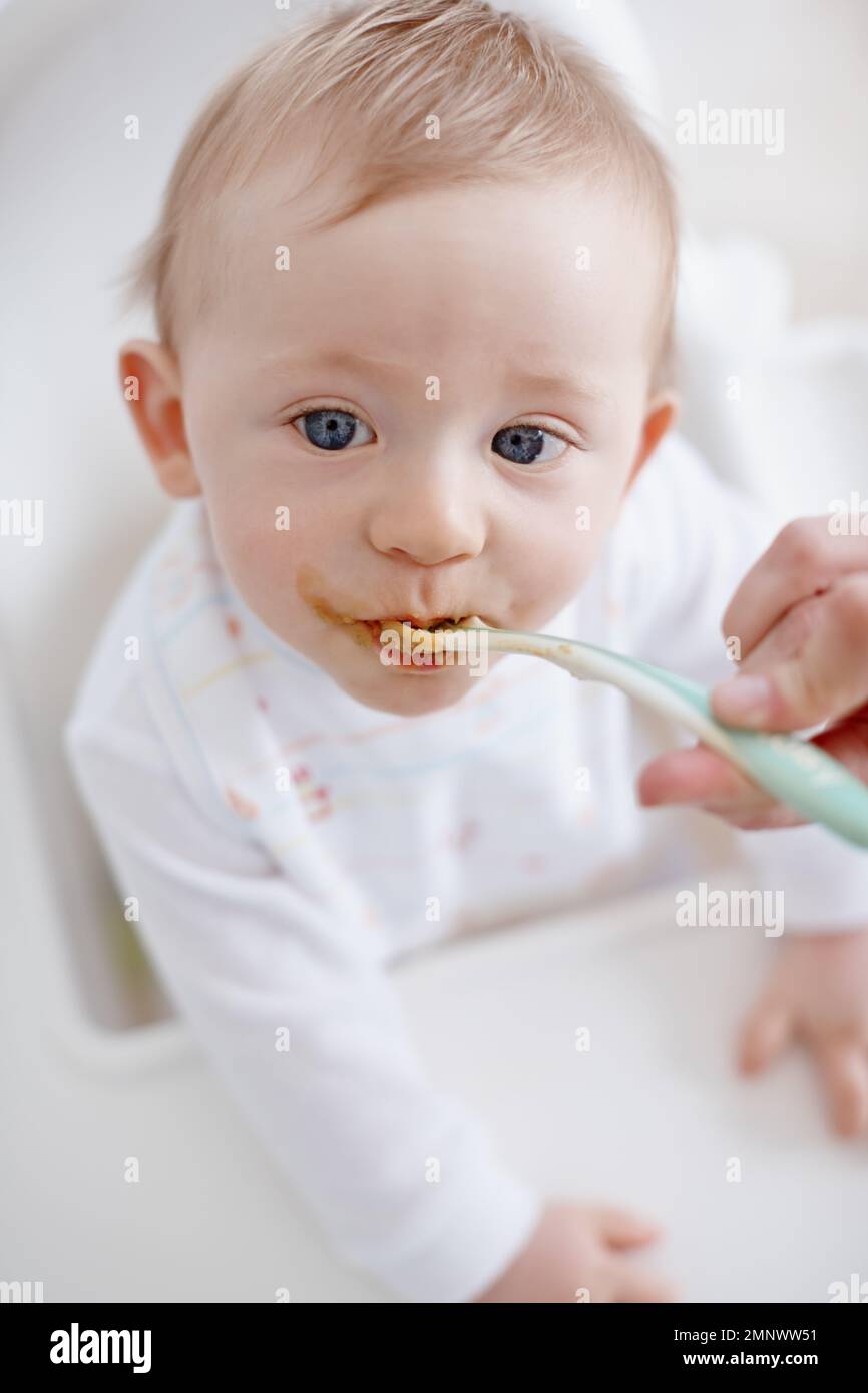 Children being fed a meal hi-res stock photography and images - Alamy