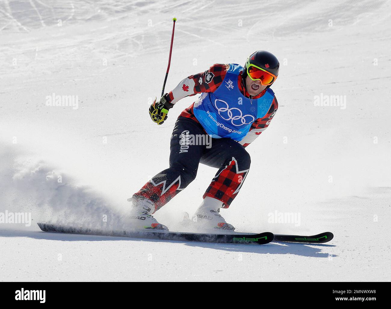 Gold medal winner BradyLeman, of Canada, crosses the finish line during ...