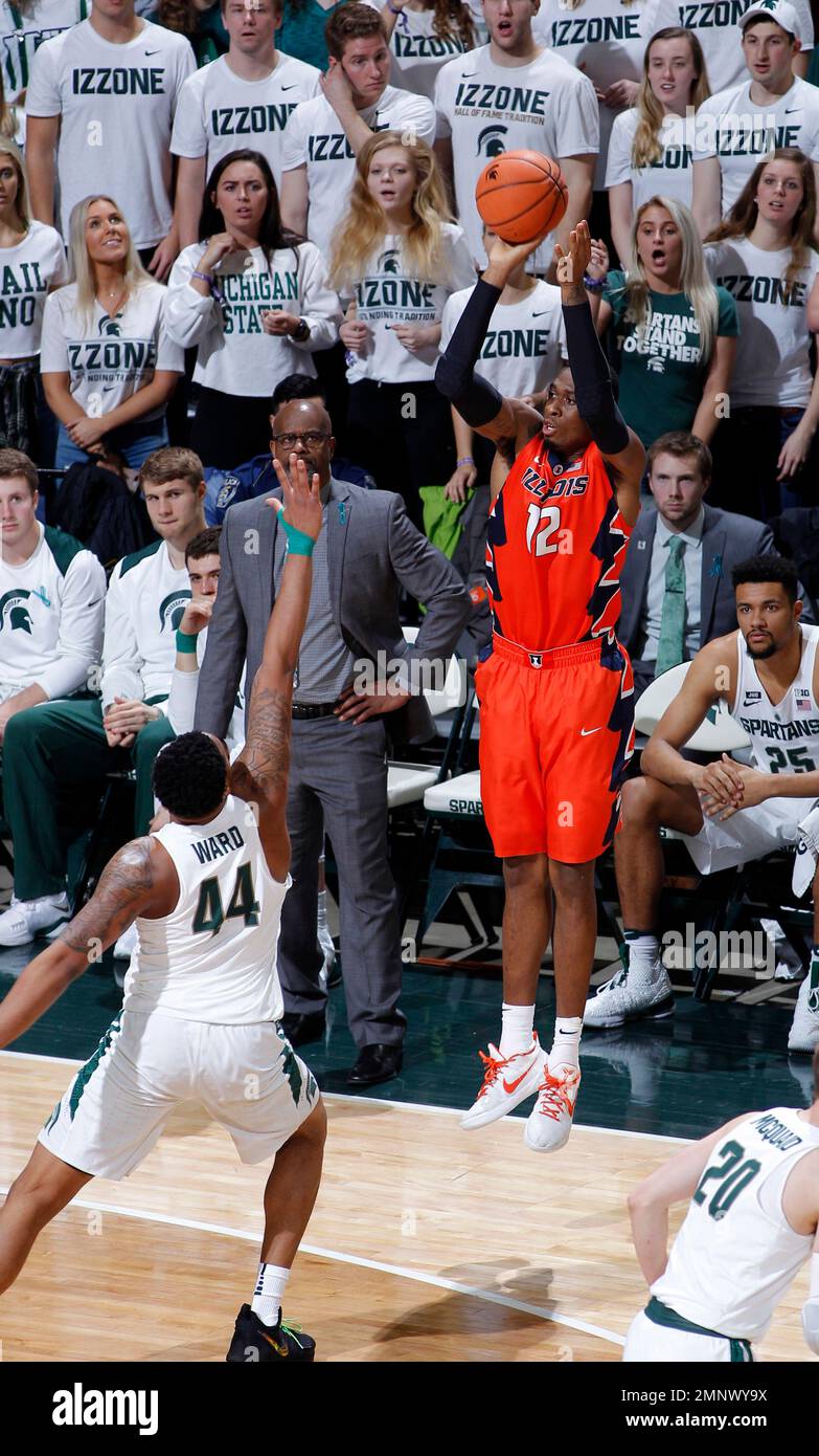 Illinois' Leron Black (12) shoots over Michigan State's Nick Ward (44 ...