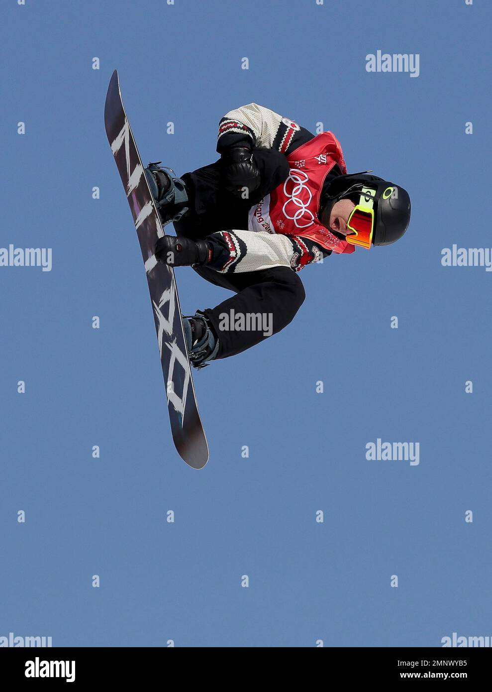 Sebastien Toutant, of Canada, jumps during the men's Big Air snowboard ...
