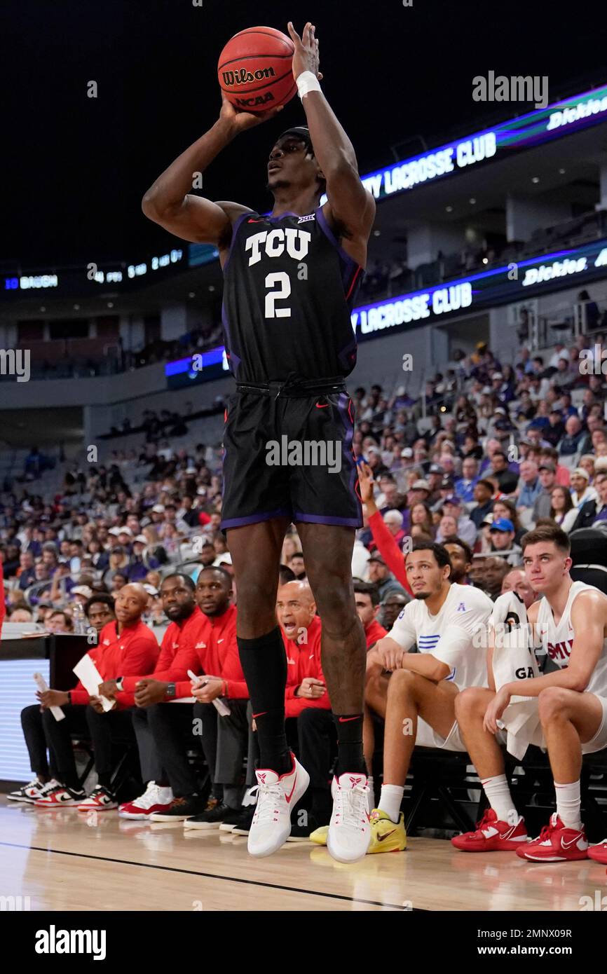 TCU forward Emanuel Miller attempts a three-point shot during an NCAA ...