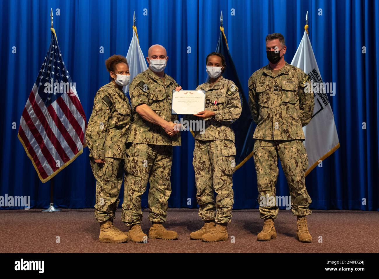 Capt. Kelly Elmore, center right, Walter Reed National Military Medical ...