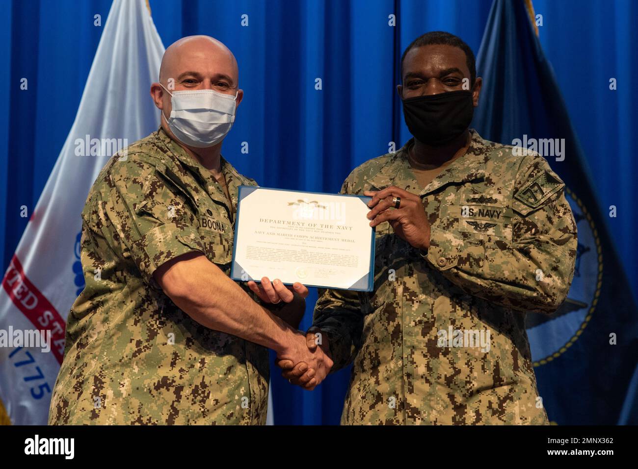 Operations Specialist 1st Class Nathan Brown receives his Navy and ...