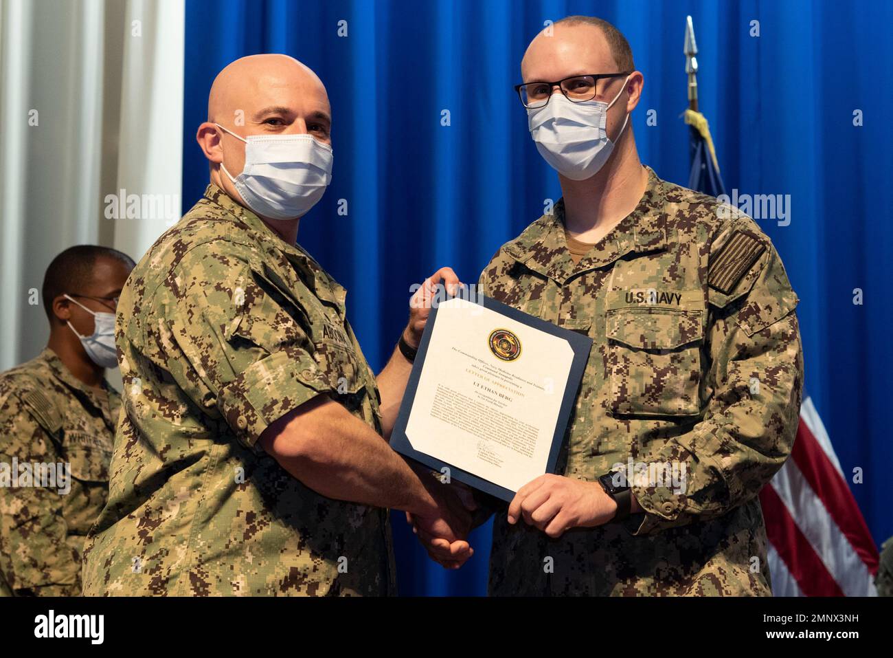 Lt. Ethan Berg receives a Letter of Appreciation from Capt. Steve ...