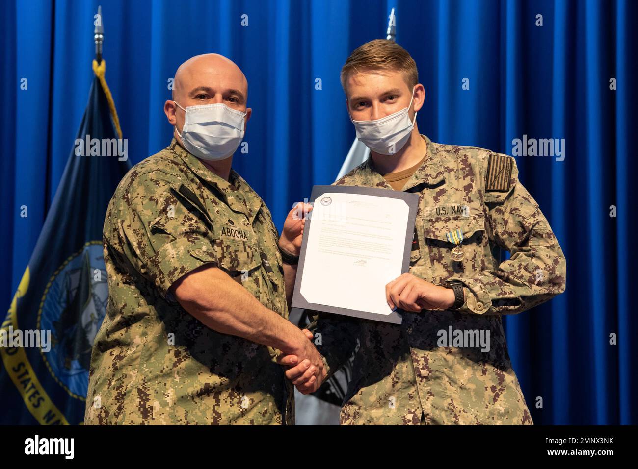 Hospital Corpsman 3rd Class Ezra Nicol receives his Military ...