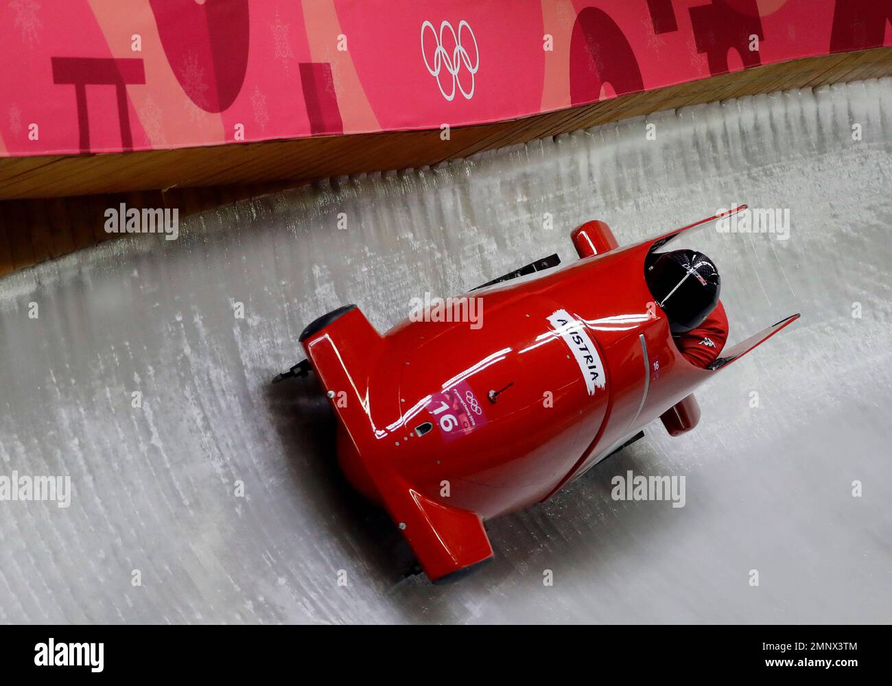 Driver Katrin Beierl and Victoria Hahn of Austria take a curve in their ...