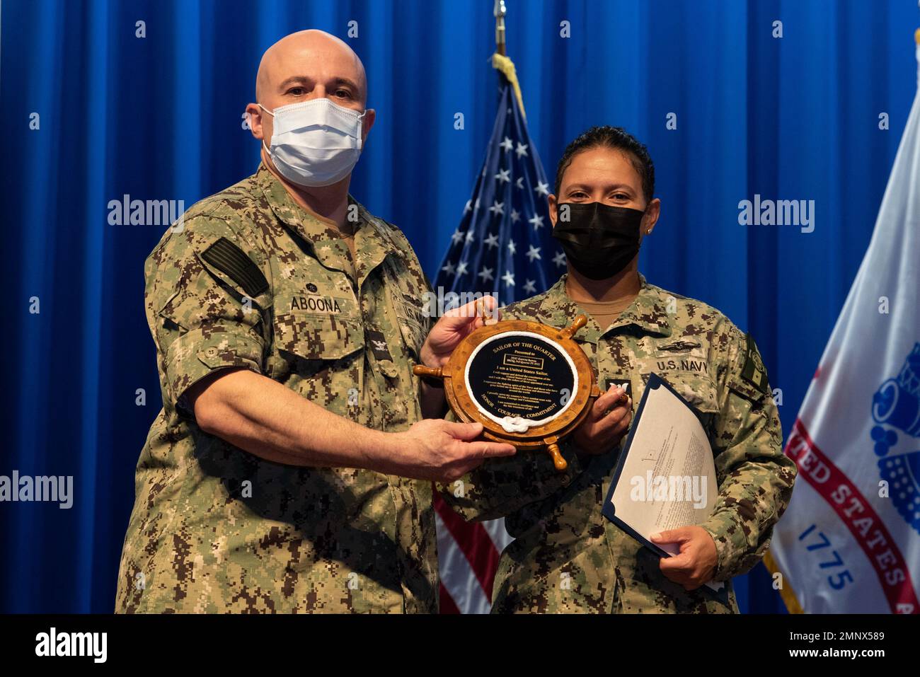 Hospital Corpsman 1st Class Corrine Ramos receives a Senior Sailor of ...