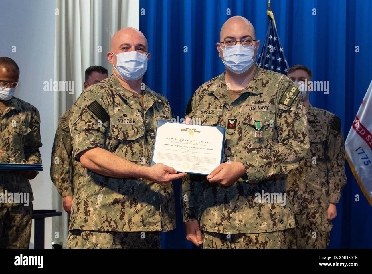 Hospital Corpsman 1st Class Drew Deboard receives his Navy and Marine ...