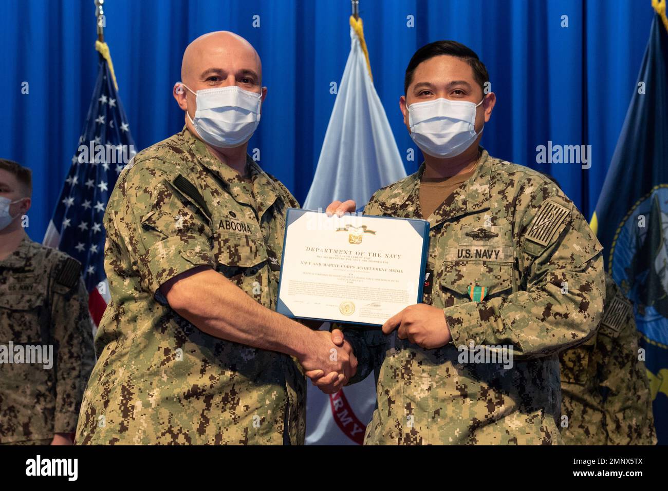 Hospital Corpsman 2nd Class Apolonio Reyes receives his Navy and Marine ...