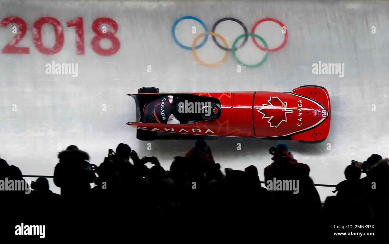 Driver Christopher Spring and Lascelles Brown of Canada compete in ...