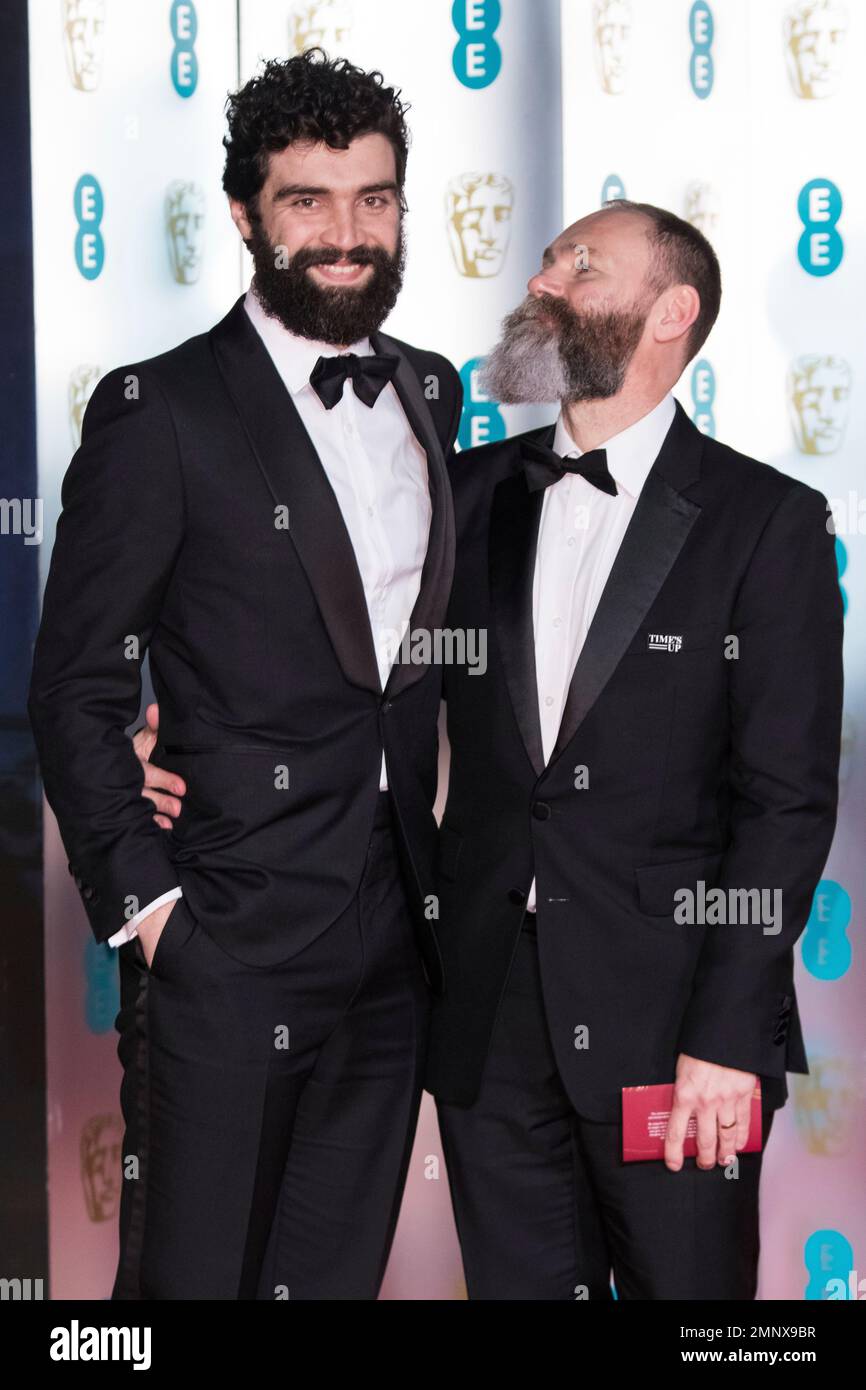 Alec Secareanu and Francis Lee pose for photographers upon arrival at ...